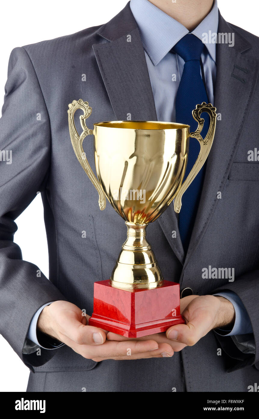 Man being awarded with golden cup Stock Photo - Alamy