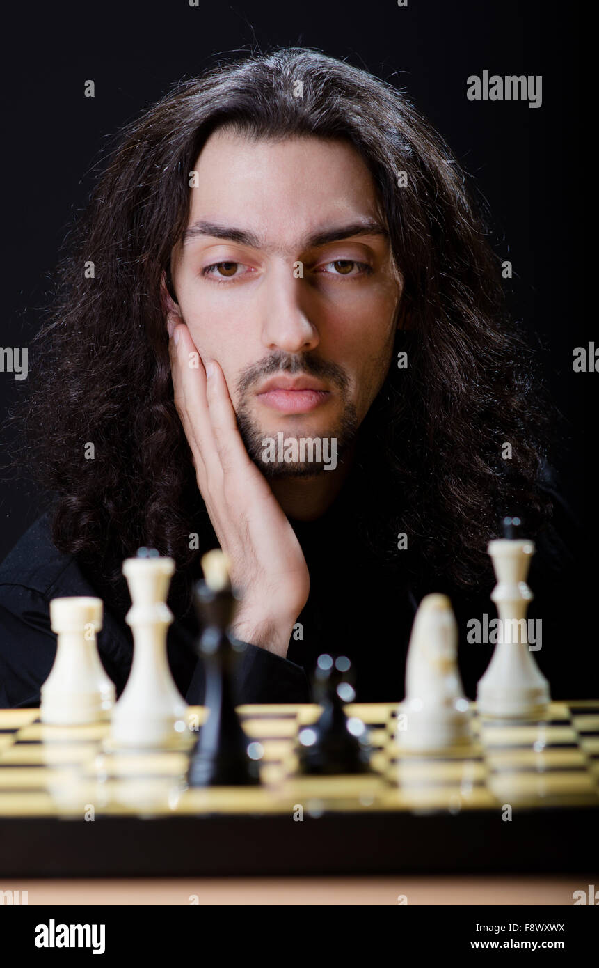 Chess player playing his game Stock Photo - Alamy