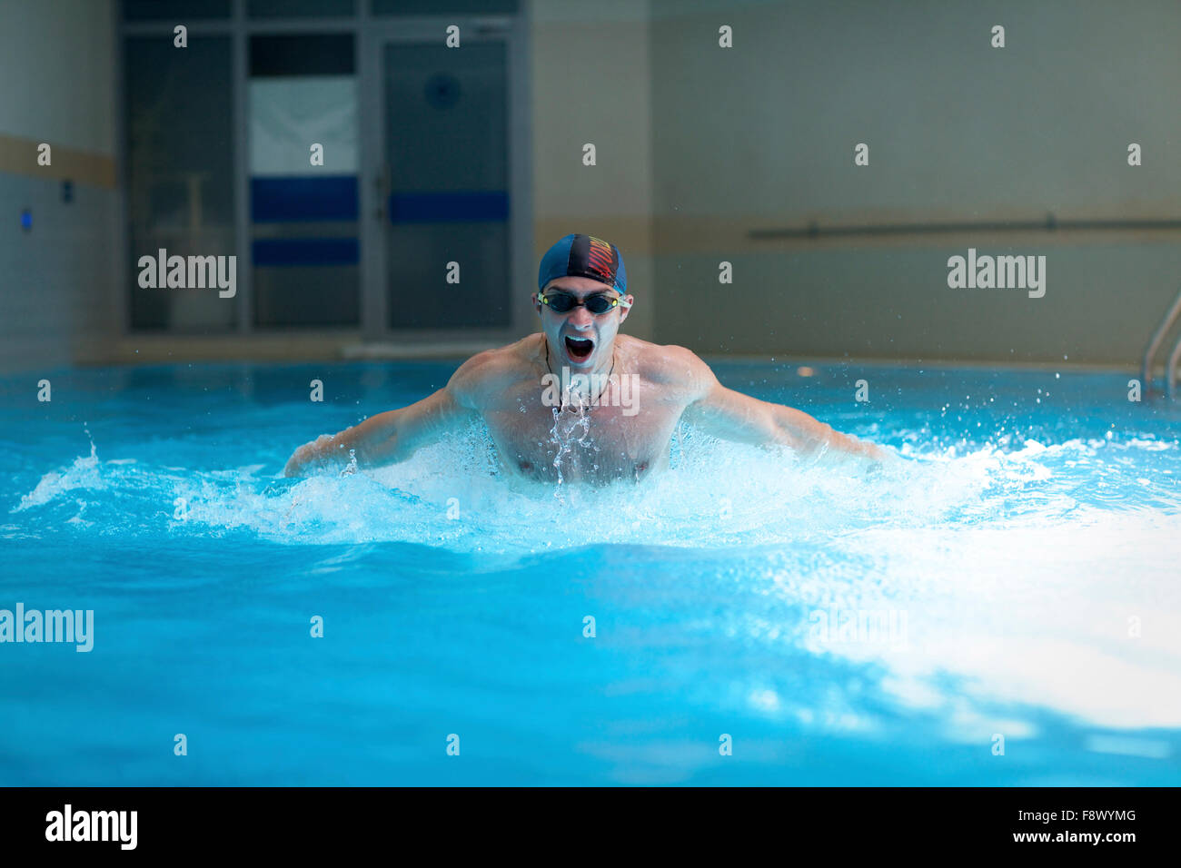 Swimmer doing butterfly hi-res stock photography and images - Alamy
