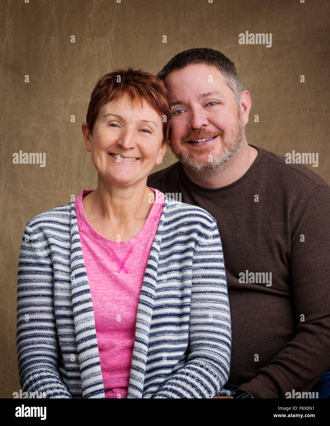Studio portrait of middle-aged married couple Stock Photo - Alamy