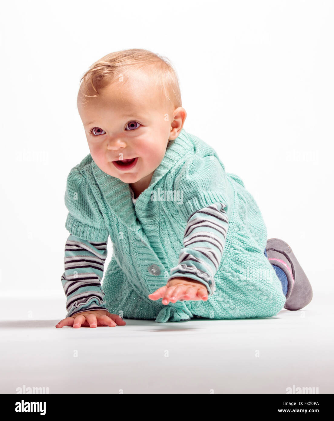 Studio photograph of cute smiling one year old baby girl Stock Photo ...