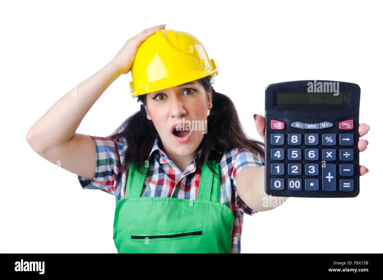 Woman builder with calculator on white Stock Photo - Alamy