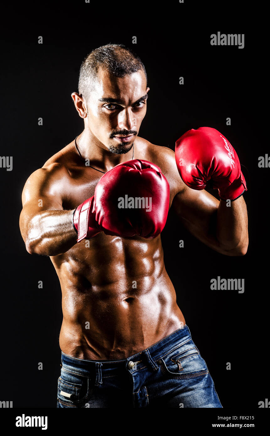 Young man with boxing gloves Stock Photo - Alamy