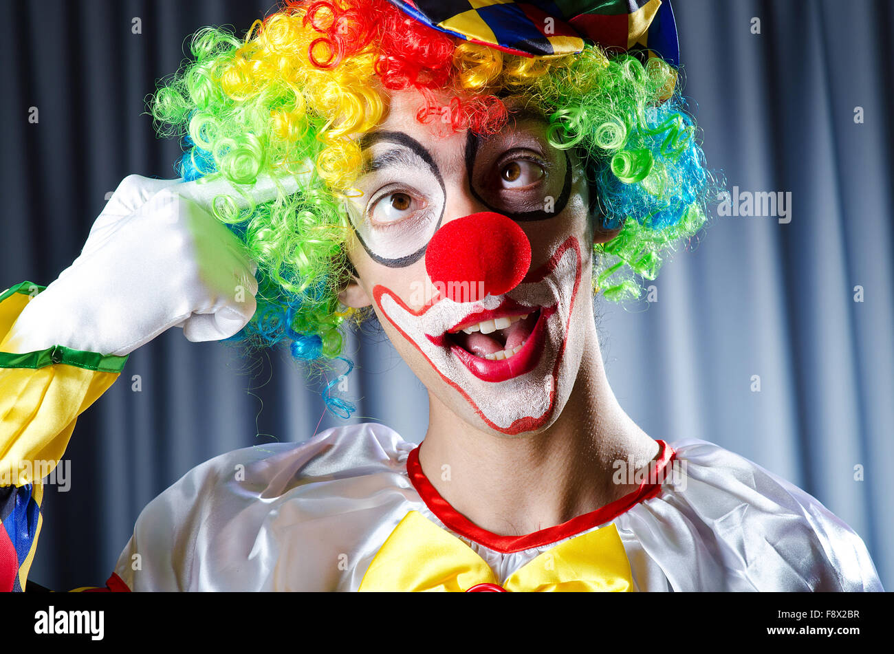Funny clown in studio shooting Stock Photo - Alamy