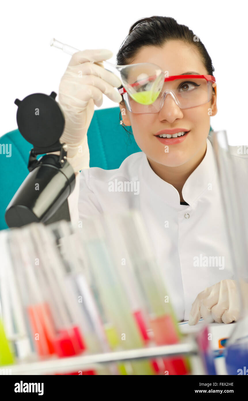 Female chemist in studio on white Stock Photo - Alamy