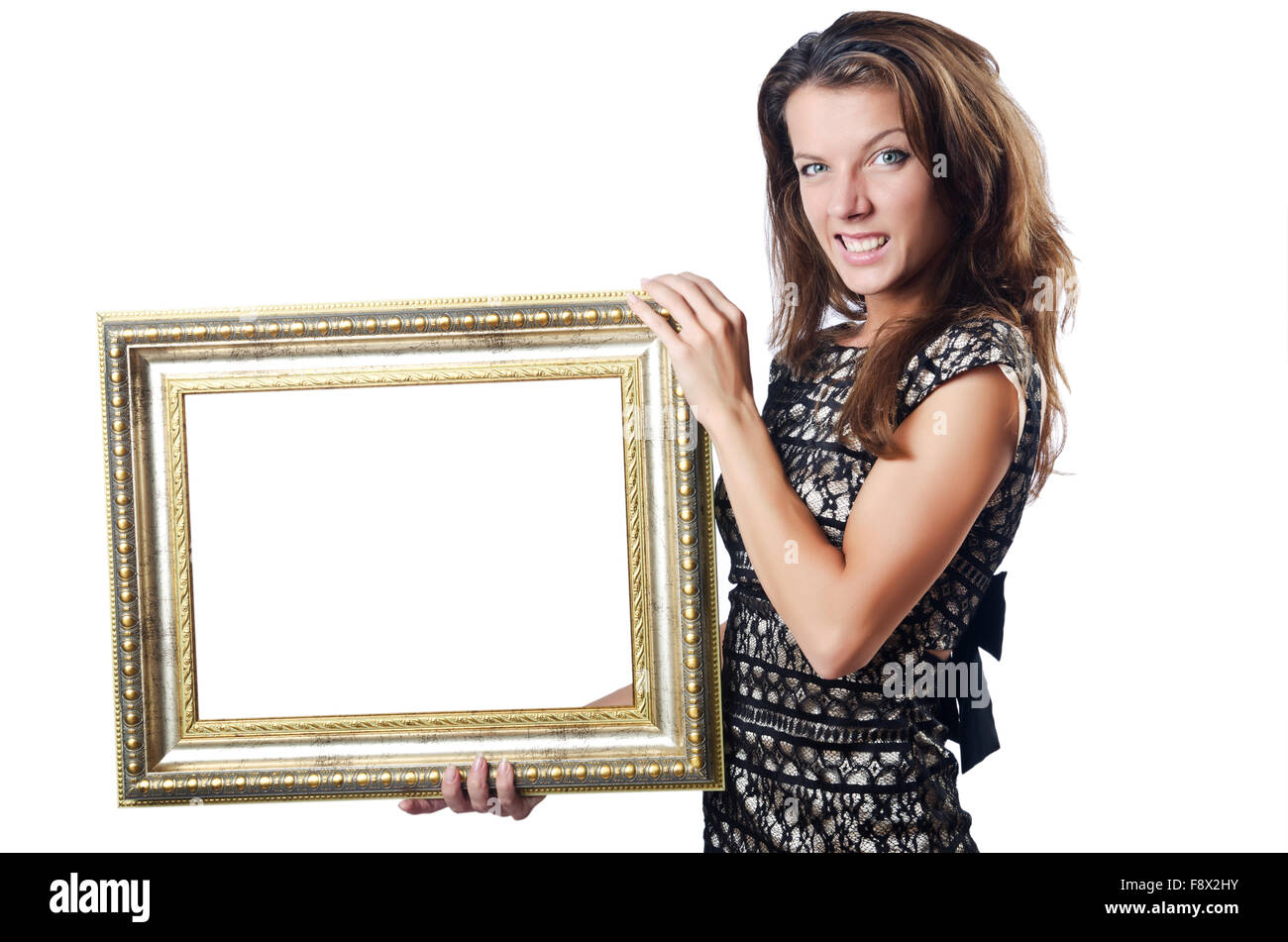 Young woman with picture frame on white Stock Photo - Alamy
