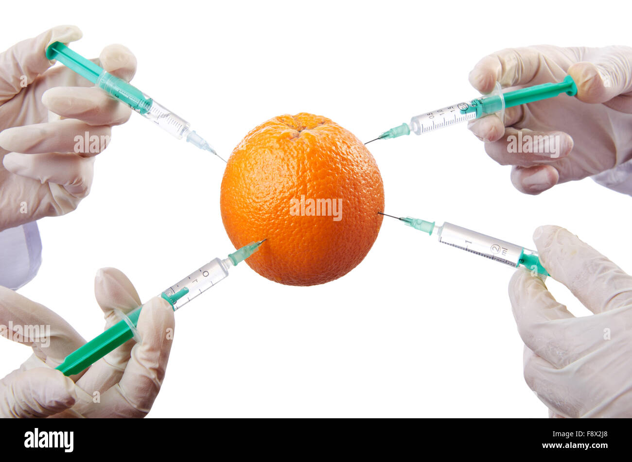 Science experiment with orange and syringe Stock Photo - Alamy