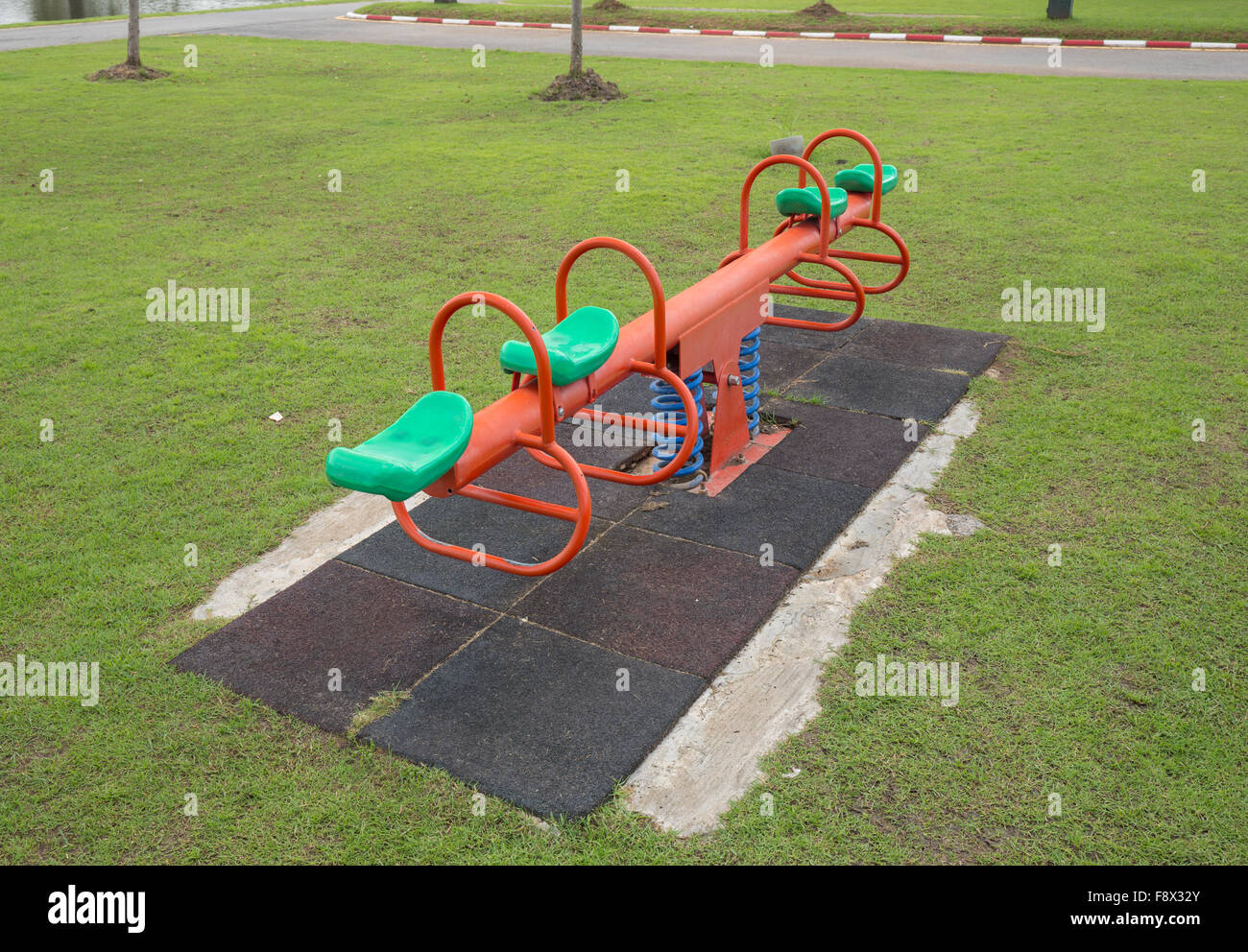 Seesaw on a children playground in the public park Stock Photo - Alamy