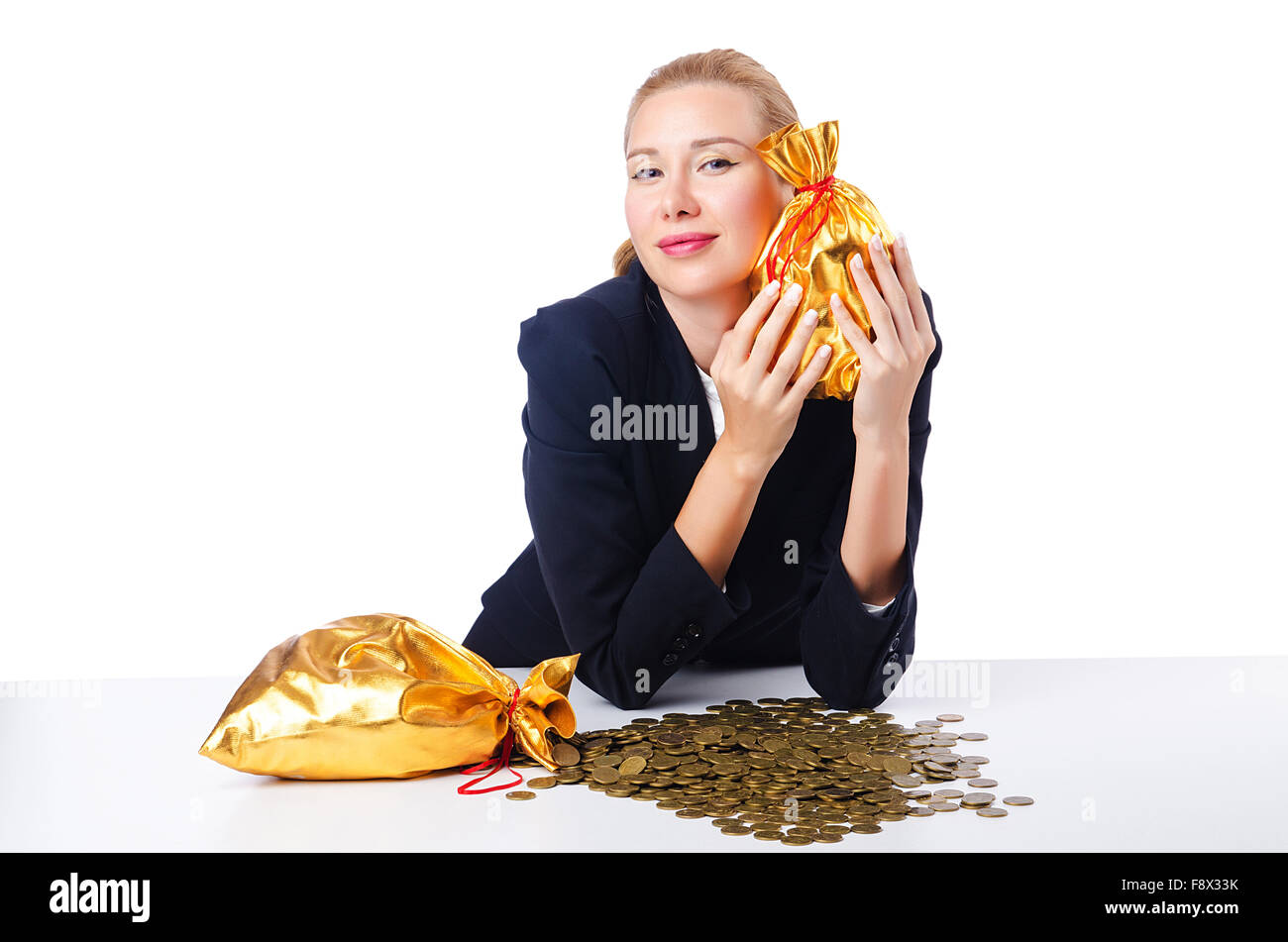 Woman with coins and golden sacks Stock Photo - Alamy