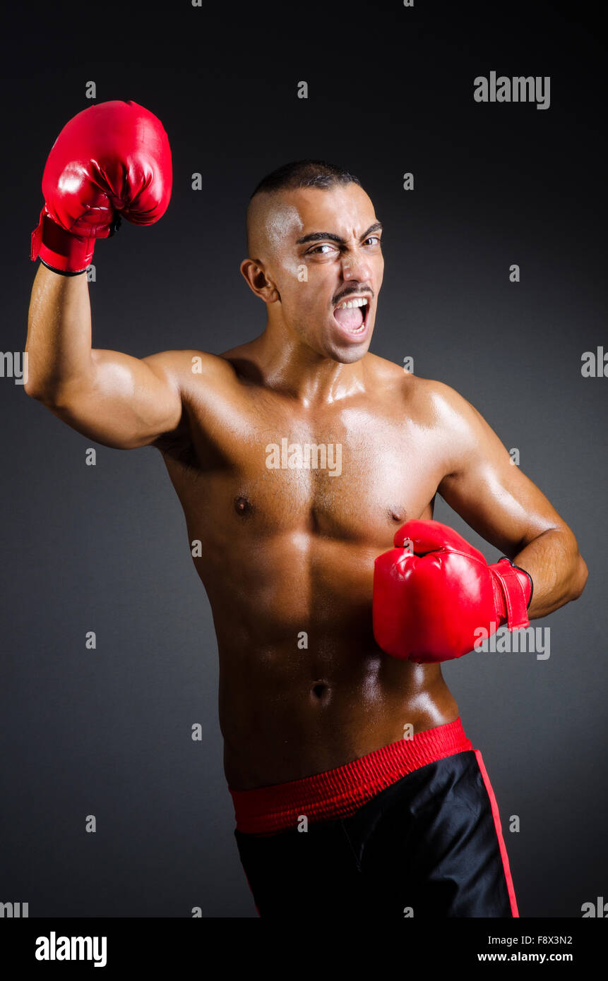 Muscular boxer in studio shooting Stock Photo - Alamy