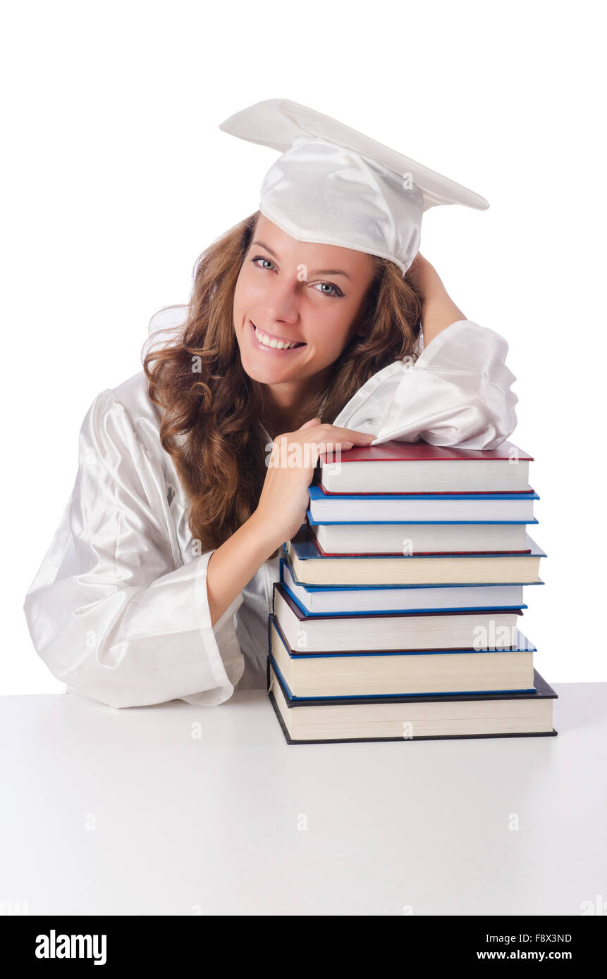 Happy graduate with lots of books on white Stock Photo - Alamy
