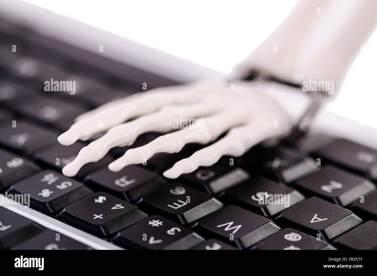 Funny skeleton working on computer hi-res stock photography and images ...