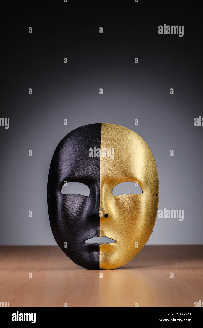 Mask against the dark background Stock Photo - Alamy