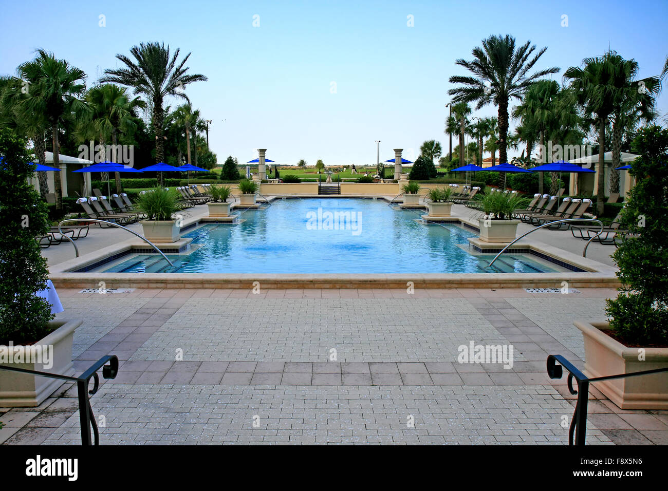the landscape and swimming pool in a resort Stock Photo - Alamy
