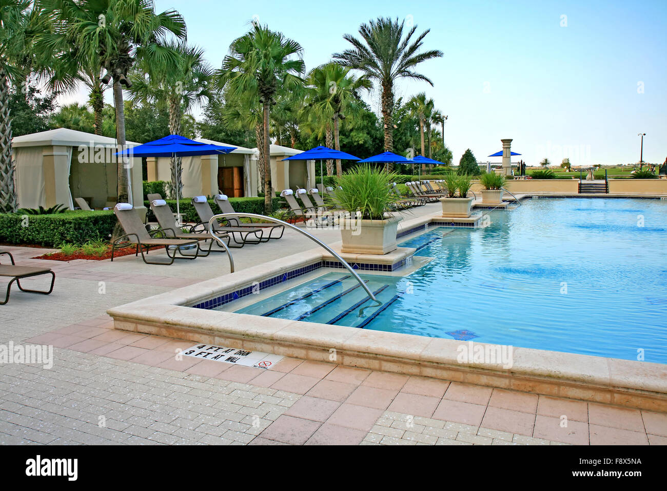 the landscape and swimming pool in a resort Stock Photo - Alamy