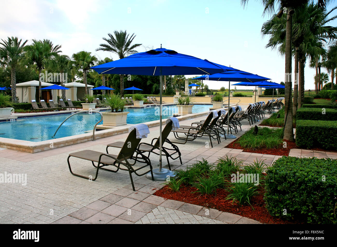 the landscape and swimming pool in a resort Stock Photo - Alamy