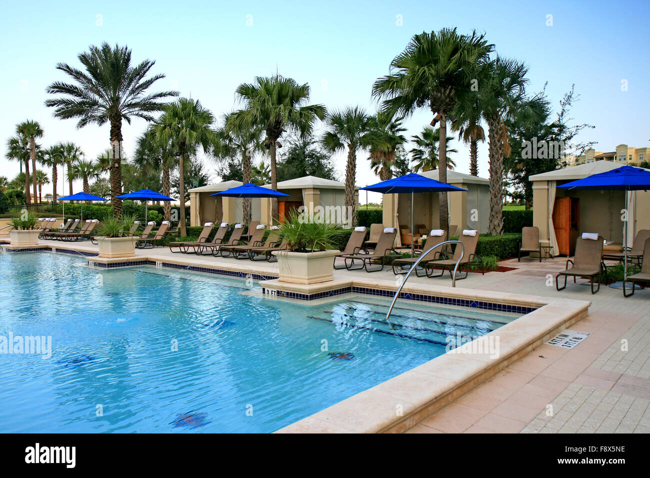 the landscape and swimming pool in a resort Stock Photo - Alamy