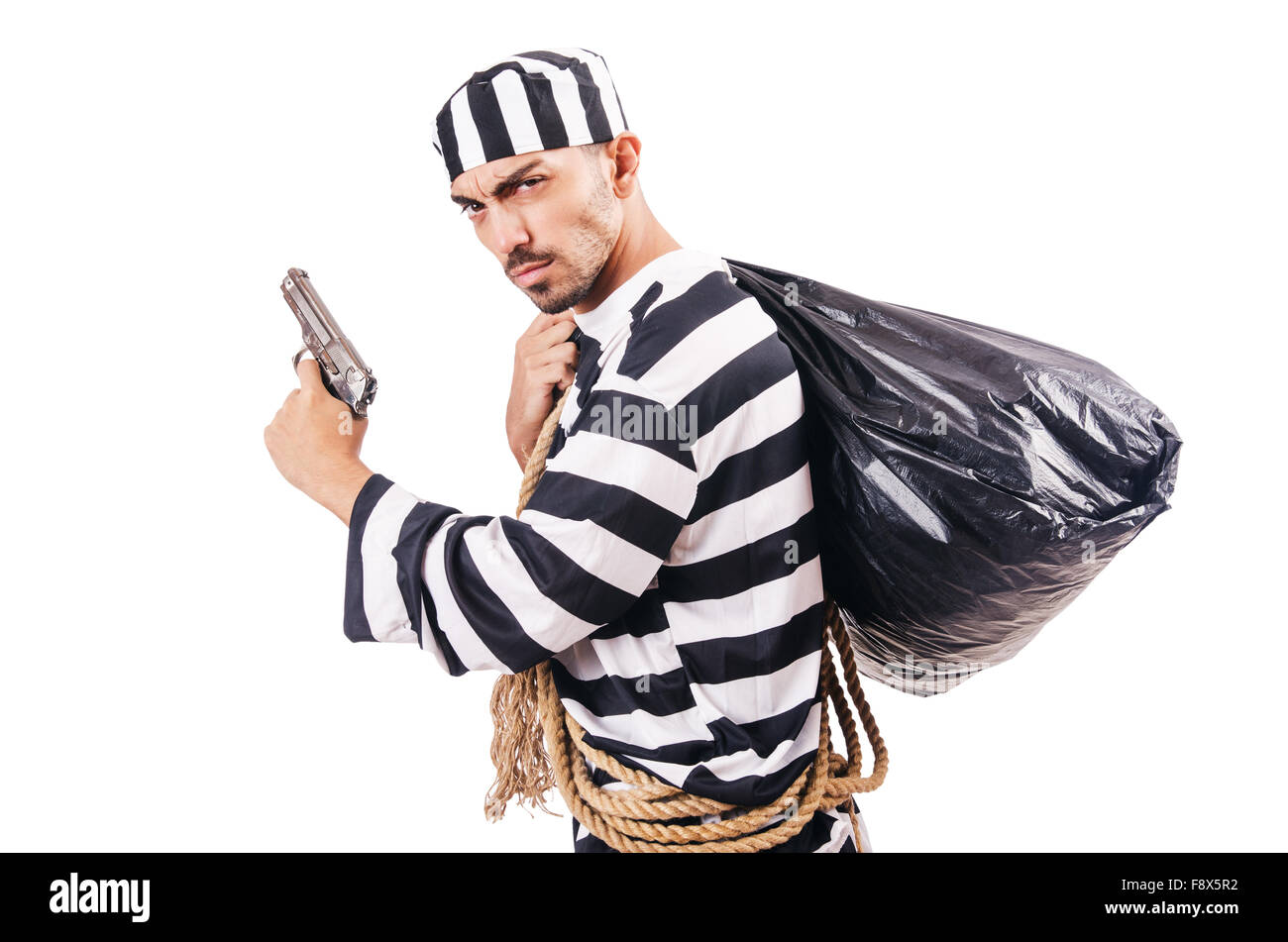 Convict criminal in striped uniform Stock Photo - Alamy