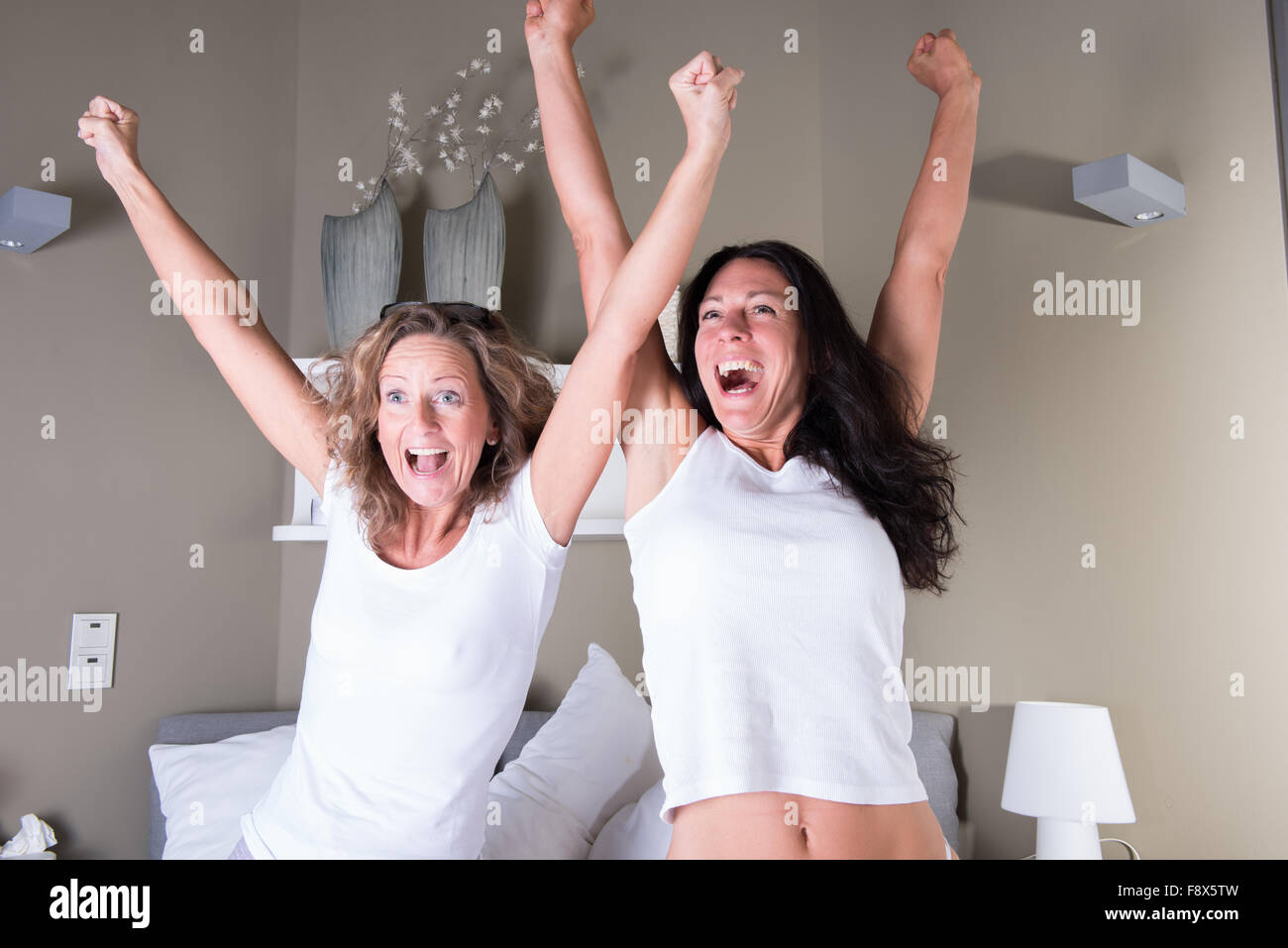 Beautiful woman cheering in hi-res stock photography and images - Alamy