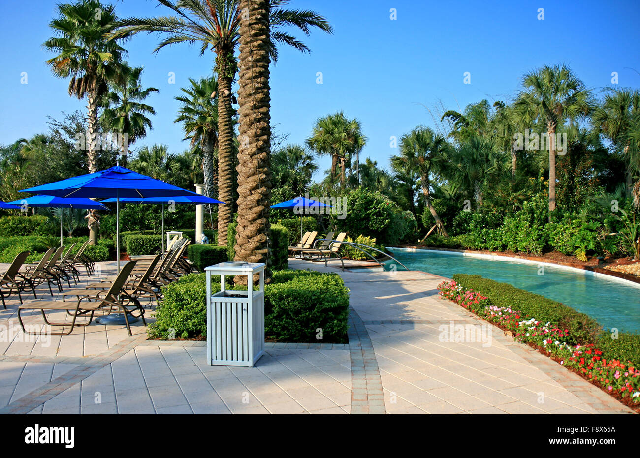 the landscape and swimming pool in a resort Stock Photo - Alamy