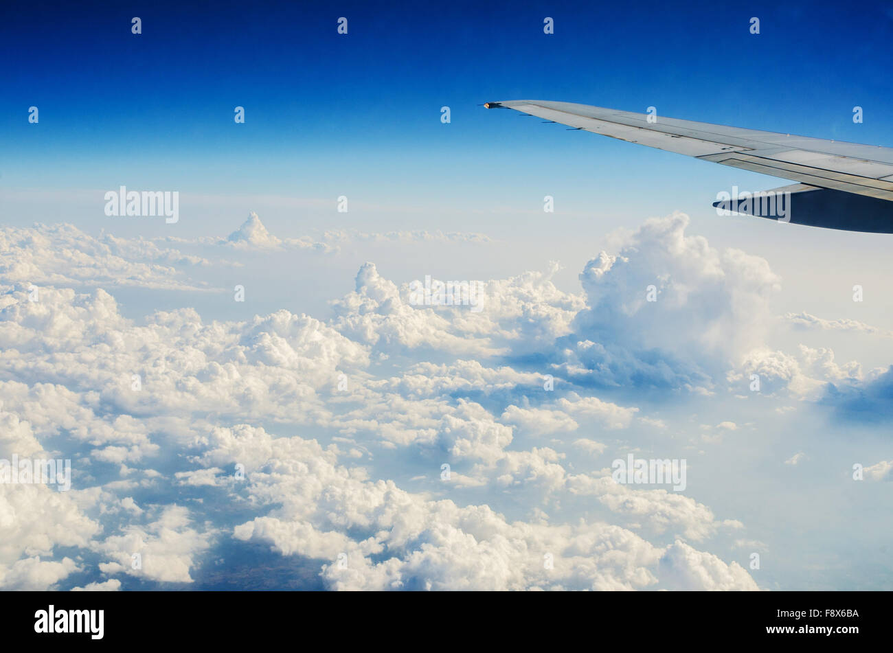 Airplane wing out of window Stock Photo - Alamy