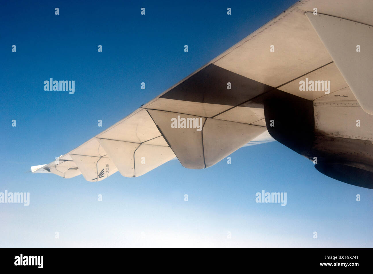 Wing of aircraft in flight Stock Photo - Alamy