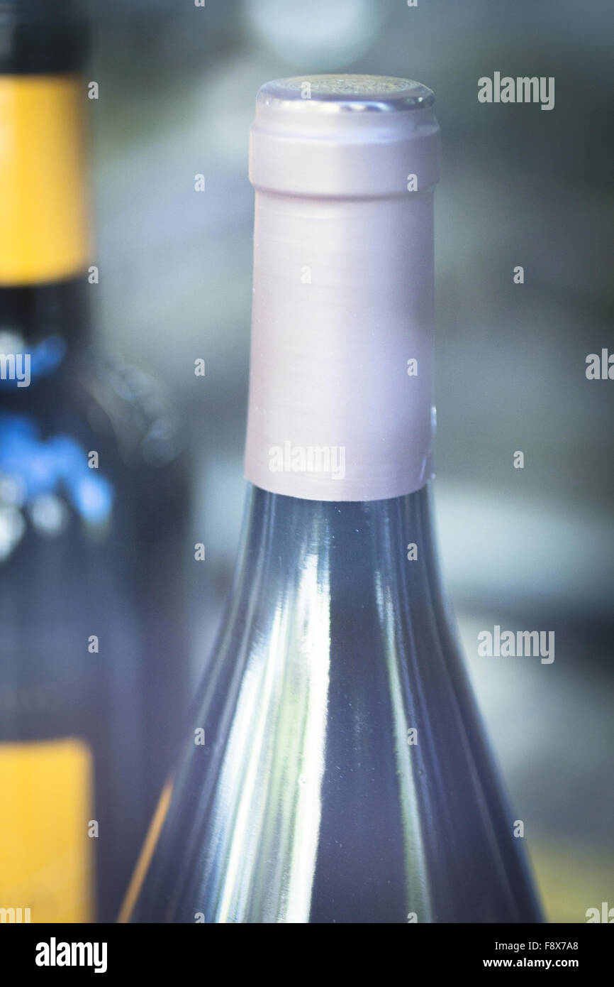 Red wine bottle in retail store window display with lighting effect ...