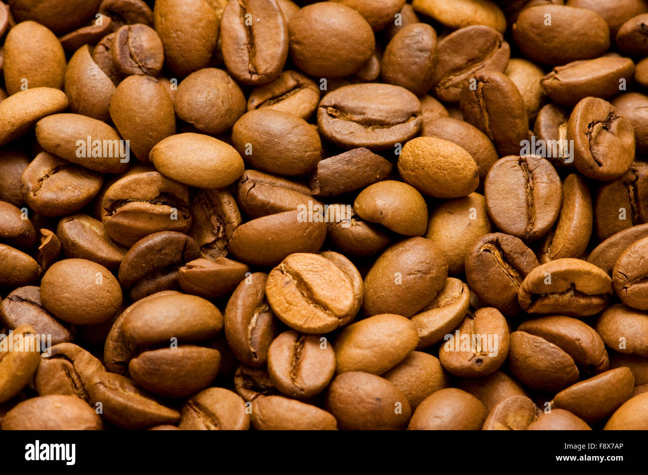 Close up of freshly roasted coffee beans Stock Photo - Alamy