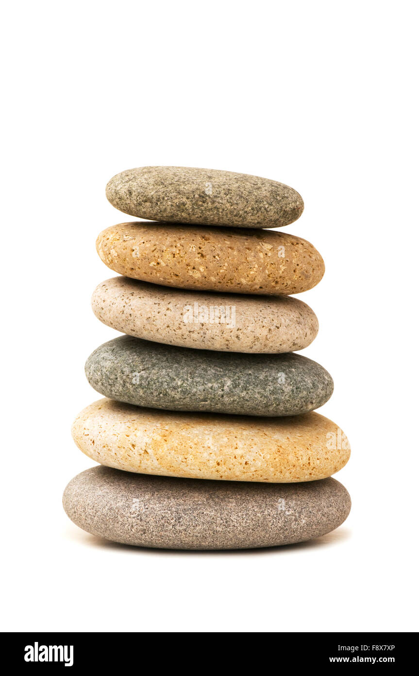 Stack of pebbles isolated on the white background Stock Photo - Alamy