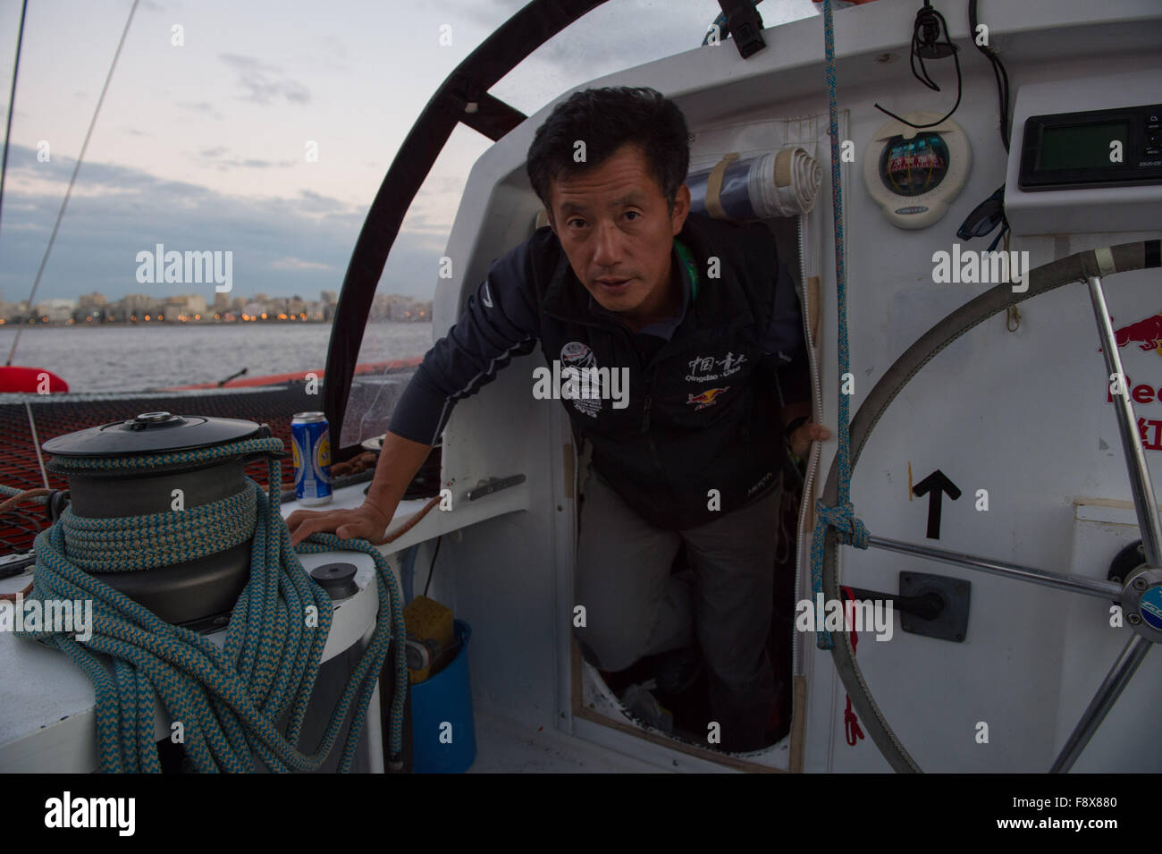 Alexandria, Egypt. 11th Dec, 2015. Captain Guo Chuan steps out of the cabin of super trimaran ...