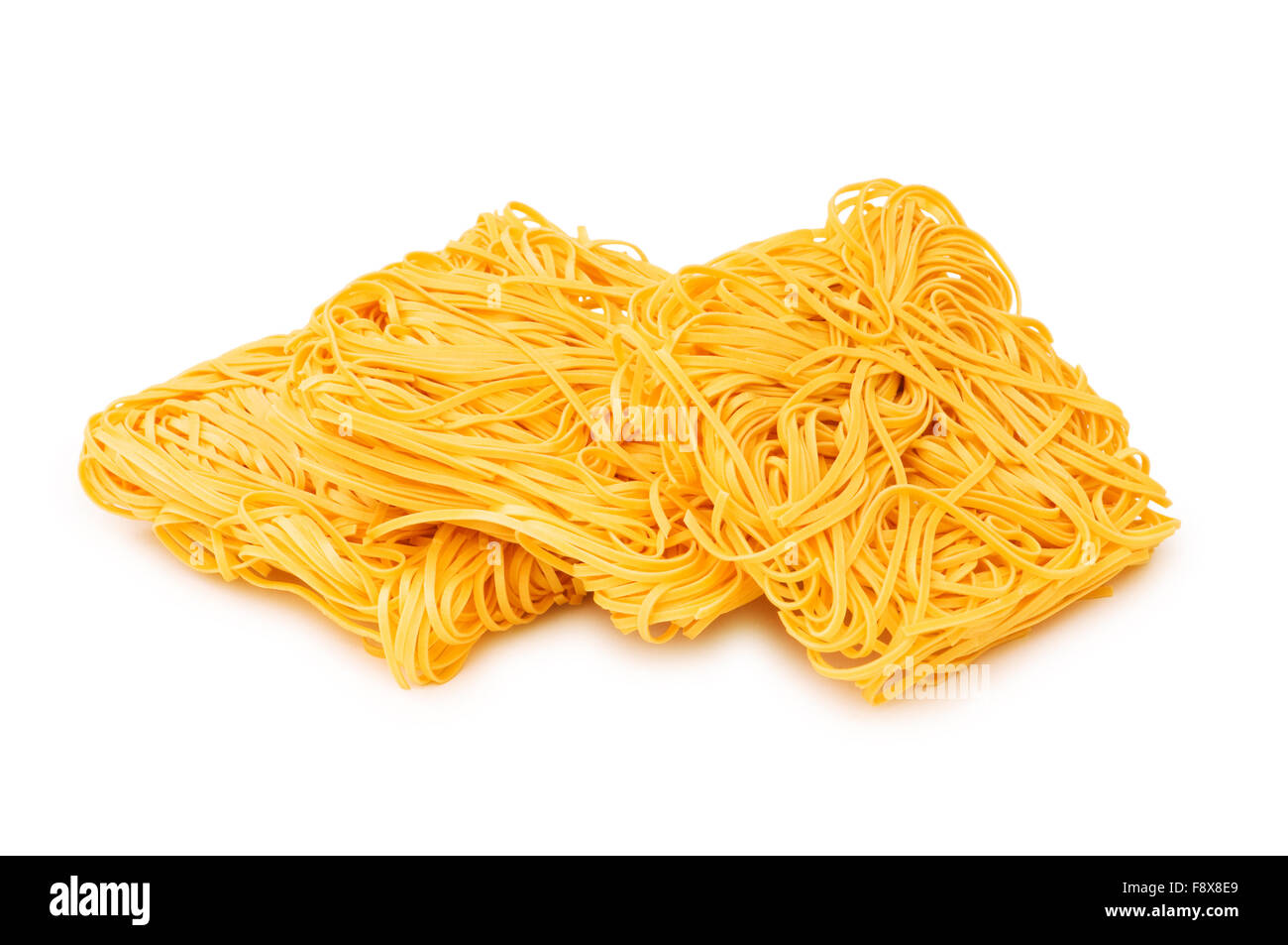 Stack of spaghetti isolated on the white Stock Photo - Alamy