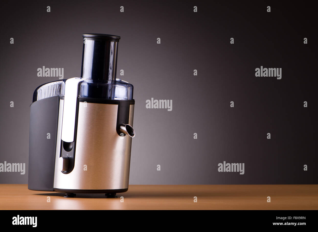 Juice extractor in kitchenware concept Stock Photo - Alamy
