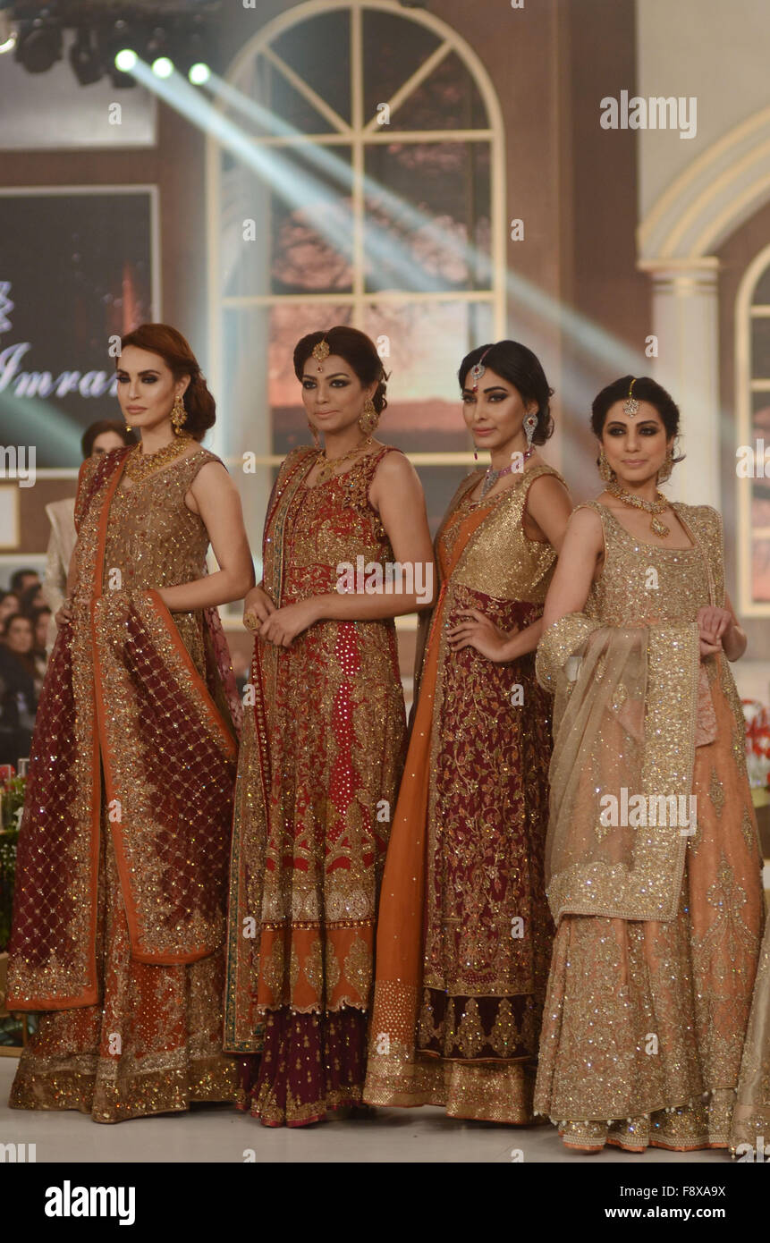 Lahore, Pakistan. 11th Dec, 2015. Pakistani models present creations by ...
