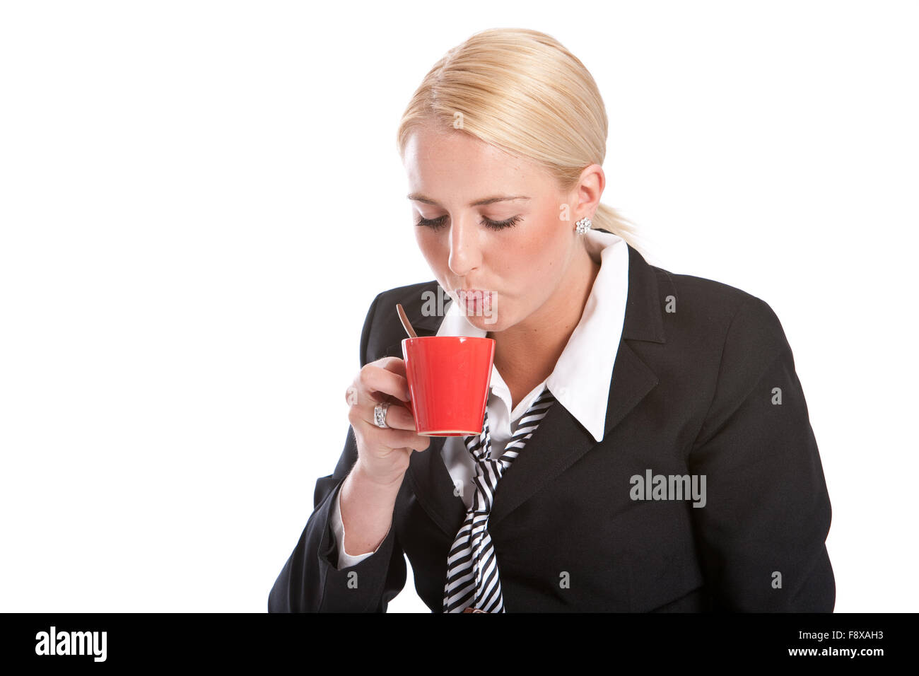 Sipping her coffee Stock Photo - Alamy