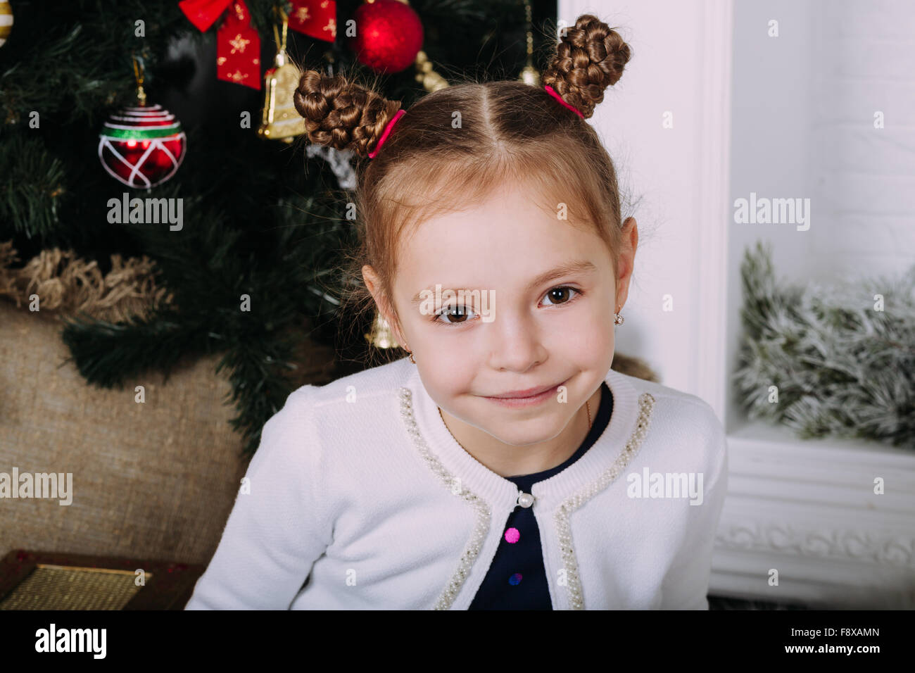 Beautiful chestnut head girl at the Christmas background Stock Photo ...