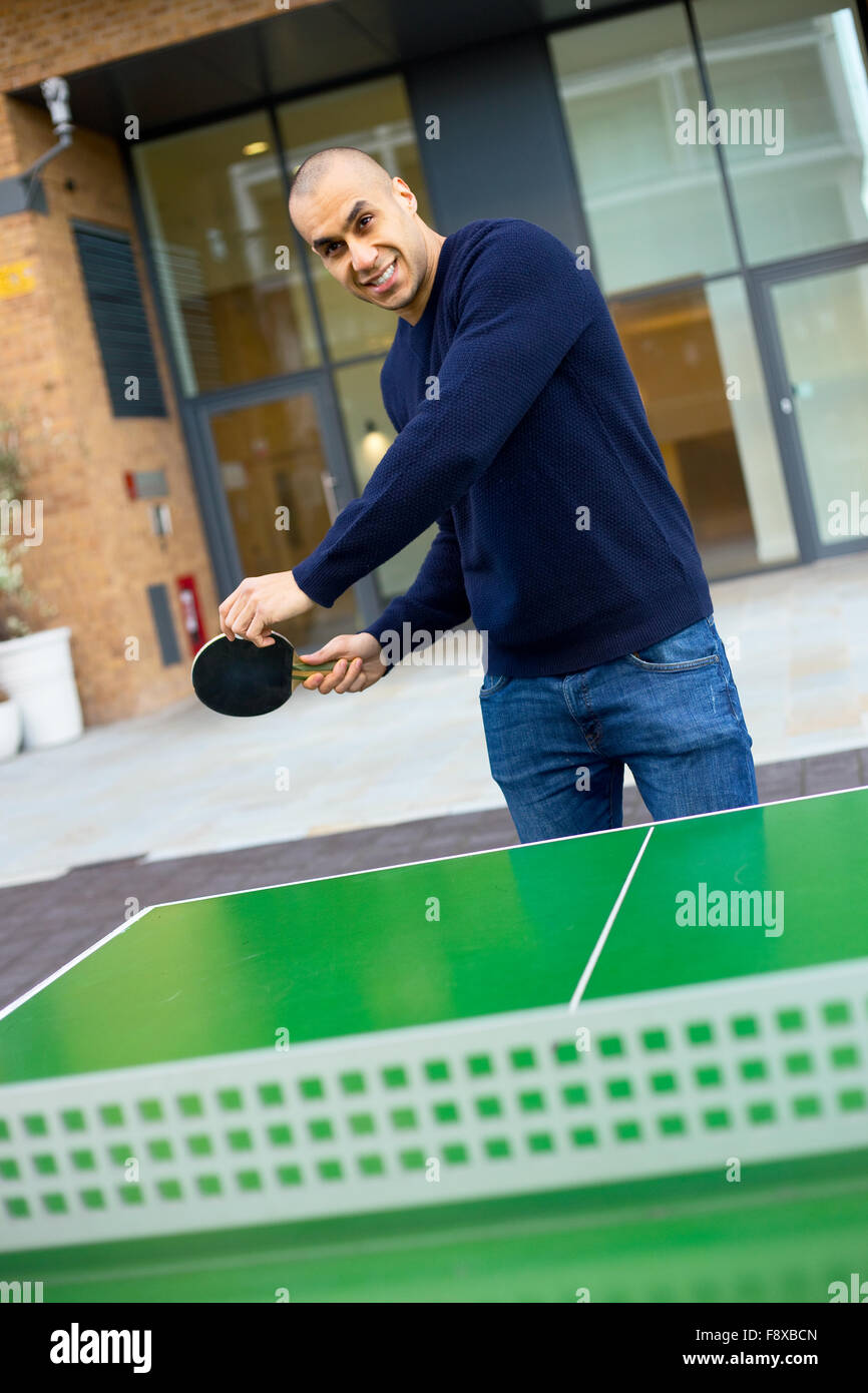 young man playing table tennis Stock Photo - Alamy