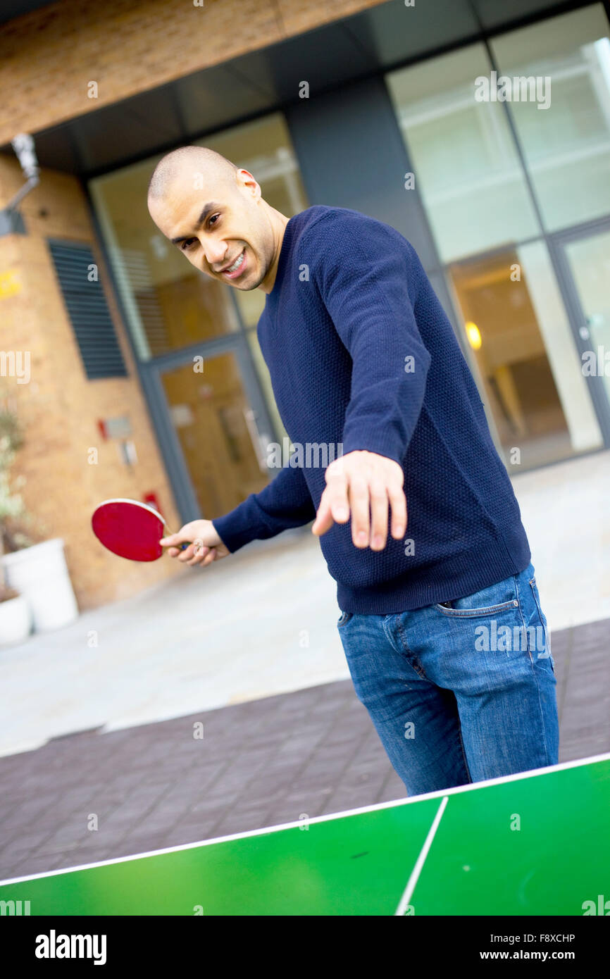 young man playing table tennis Stock Photo - Alamy