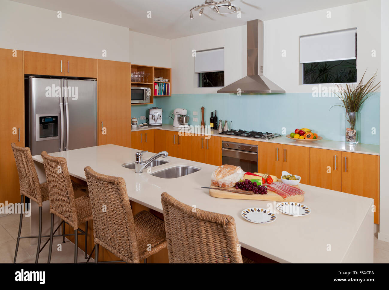 Modern kitchen with food and fruit platter Stock Photo - Alamy