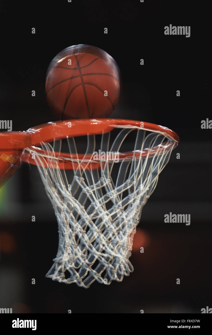 Basketball Going In the Hoop Stock Photo - Alamy