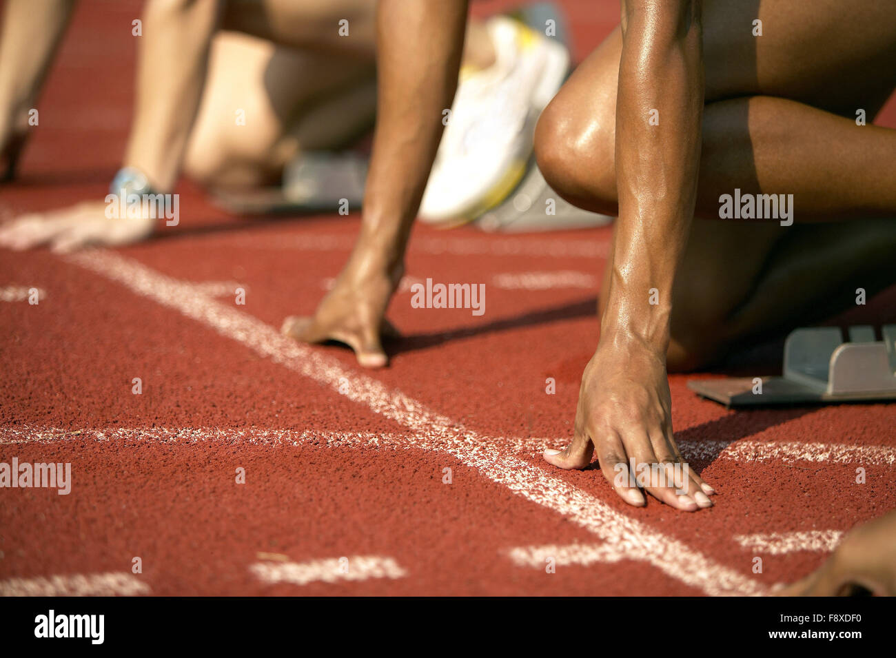 Female sprinter starting block hi-res stock photography and images - Alamy