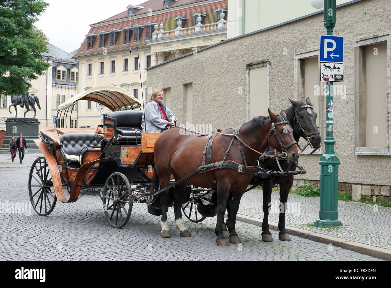 Horses and carriage in Weimar Stock Photo - Alamy