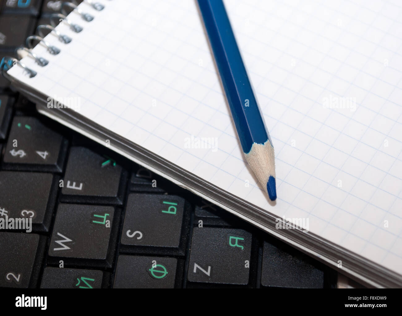 Office desk with pencil, laptop and notebook Stock Photo - Alamy