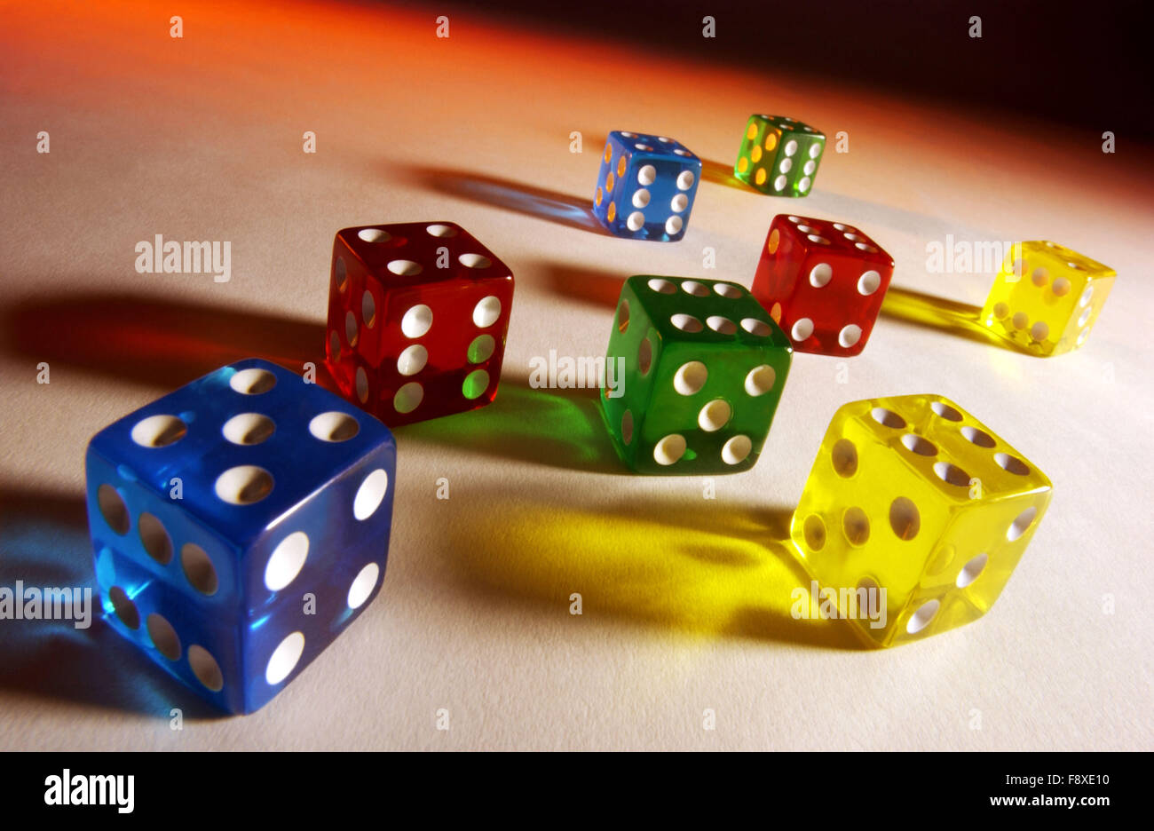 Different Colored Dice Stock Photo - Alamy