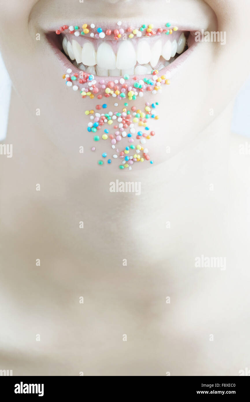 Person with Candy-Coated Mouth Stock Photo - Alamy