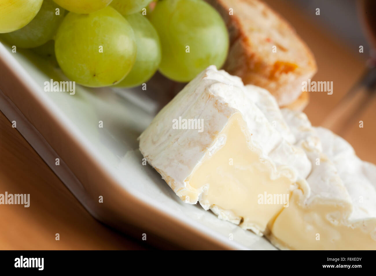camembert cheese and raisins Stock Photo - Alamy