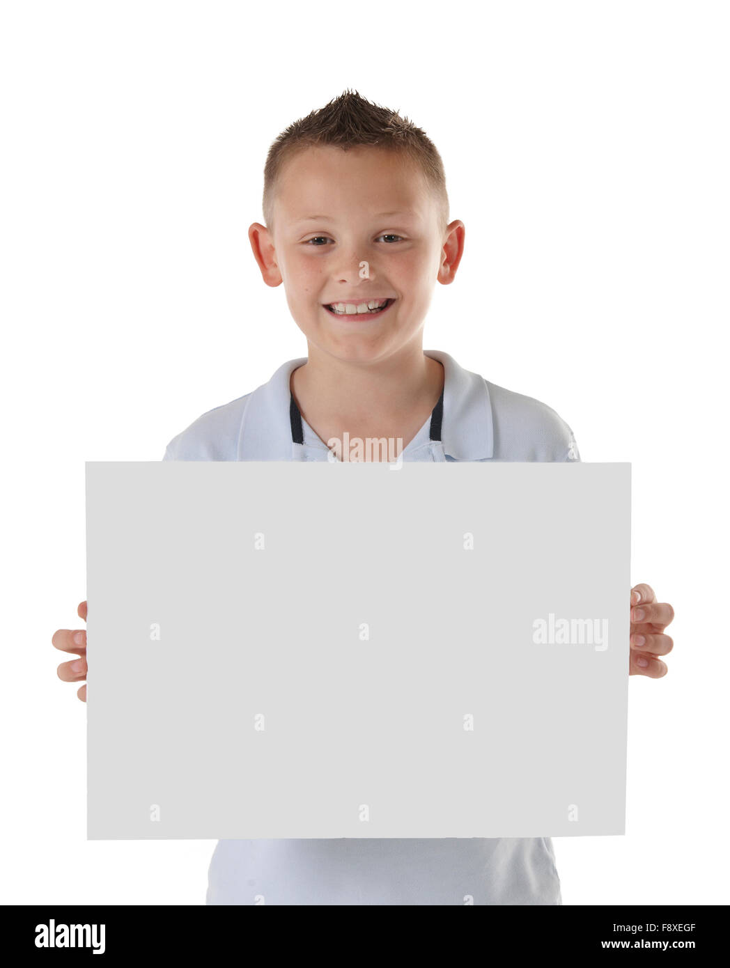 Boy holding blank board Stock Photo - Alamy