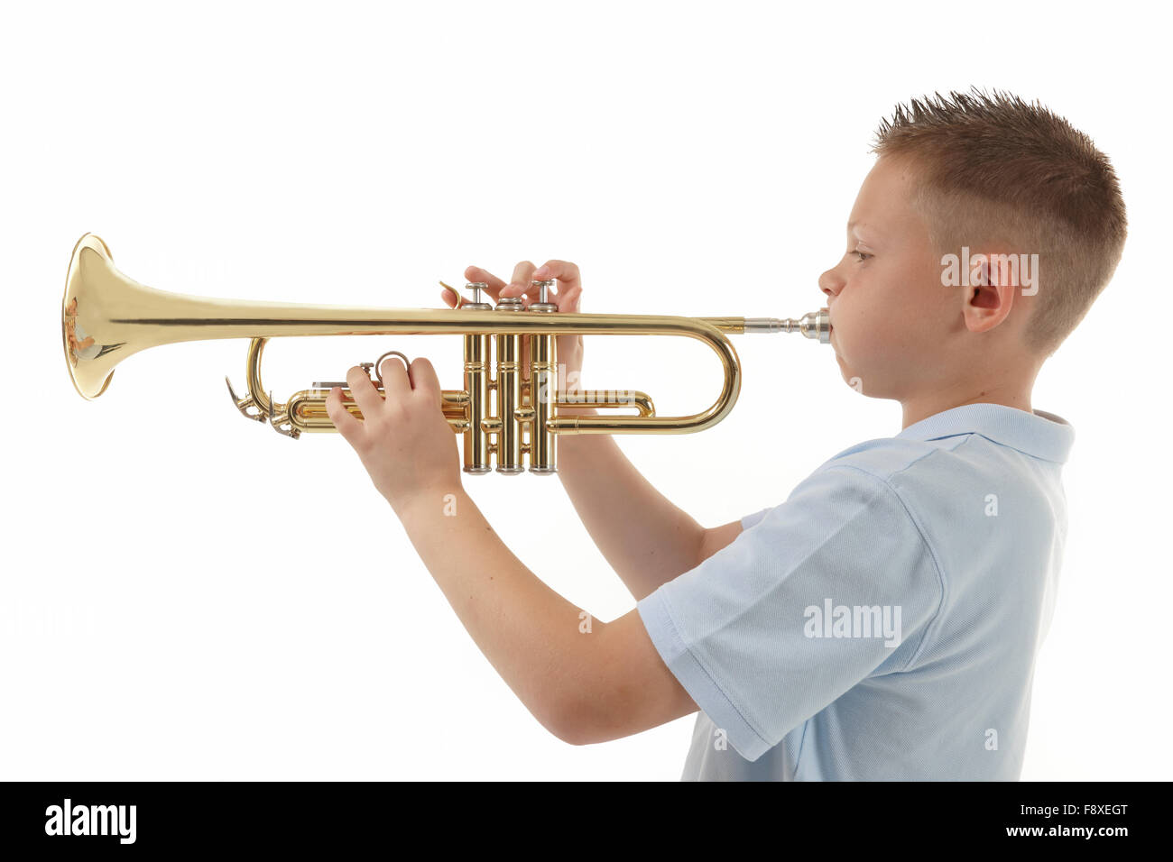 Boy playing Trumpet Stock Photo - Alamy