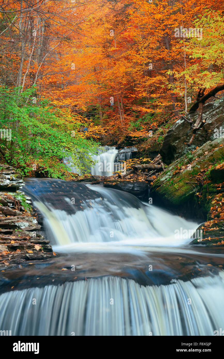 Autumn waterfalls in park with colorful foliage Stock Photo - Alamy