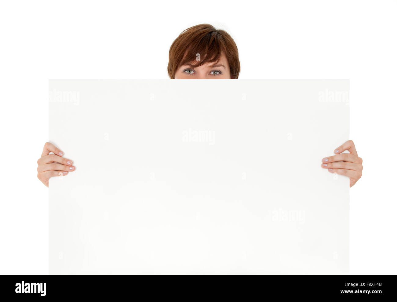 Smiling eyes behind a blank banner ad Stock Photo - Alamy