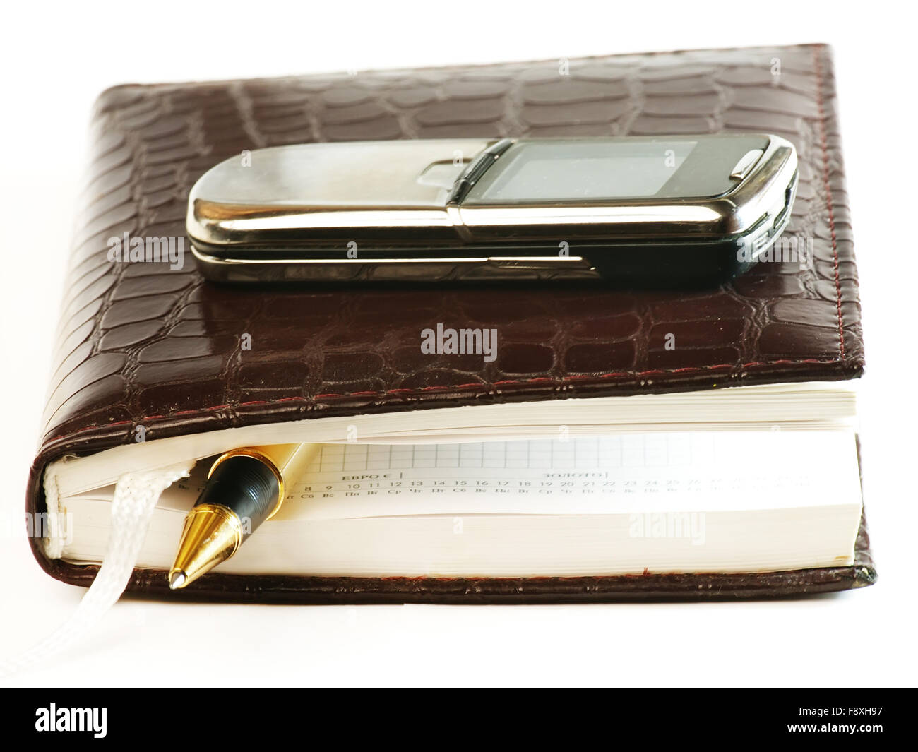 Notebook and pen Stock Photo - Alamy